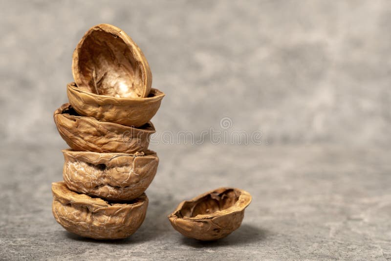 Walnut Shells Stacked in a Tower Stock Photo - Image of cross, group ...