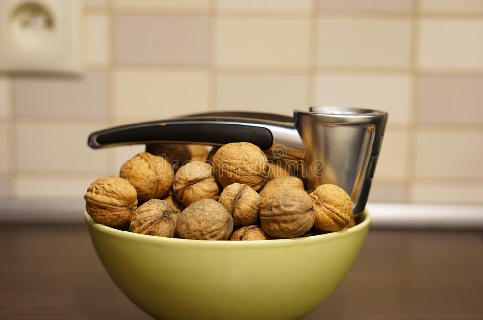 Walnuts in bowl stock image. Image of table, walnuts - 62902829