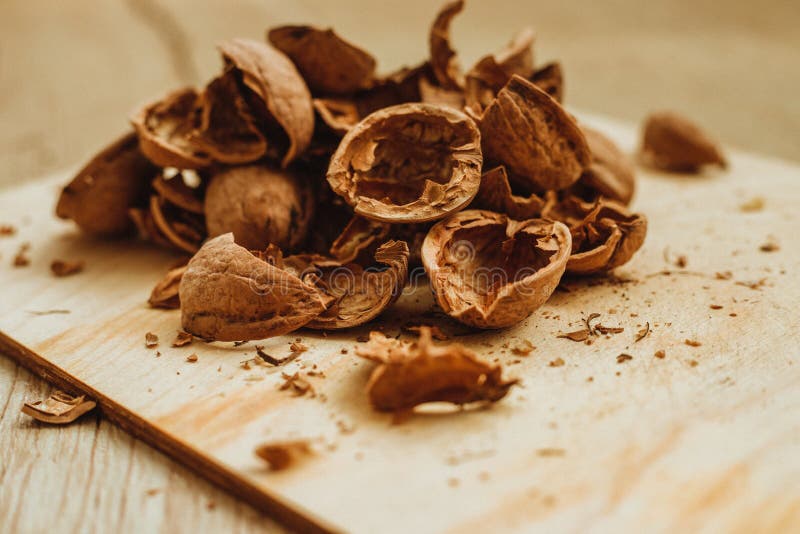 Walnuts, Broken Shells. Nut Kernels on a Wooden Board. Close Up ...