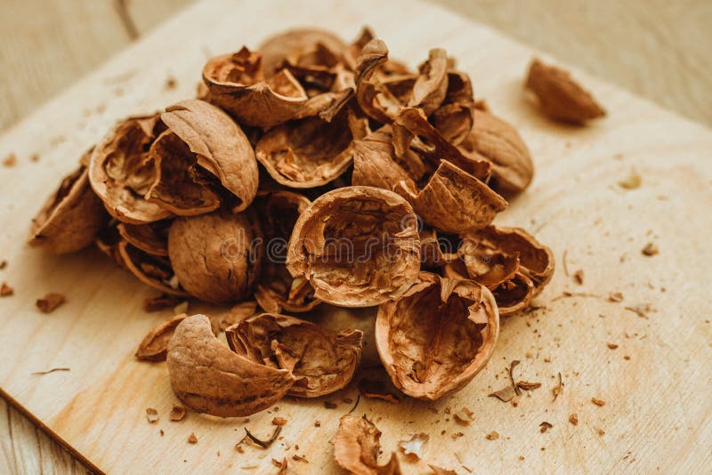 Walnuts, Broken Shells. Nut Kernels on a Wooden Board. Close Up ...