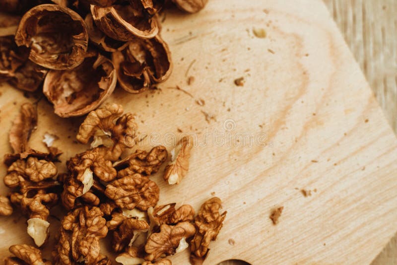 Walnuts, Broken Shells. Nut Kernels on a Wooden Board. Close Up ...