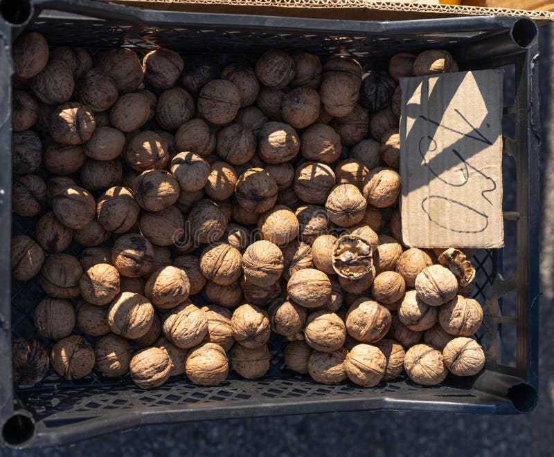 Walnuts for Sale in Yellow Open Woven Bags. Stock Image - Image of ...