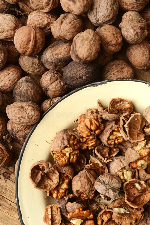 Walnuts Cracked Open with Old Nut Cracker in a Vintage Plate Stock ...