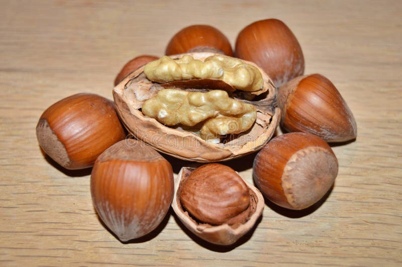 Walnuts and Hazelnuts on the Red Table As Background Stock Image ...
