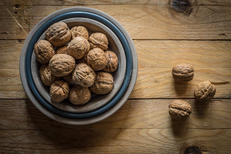 Walnuts Inside Plate Over Wooden Board Stock Photo - Image of view ...