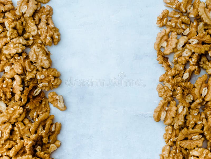 Walnuts Kernel on Light Blue Background, Top View. Stock Photo - Image ...