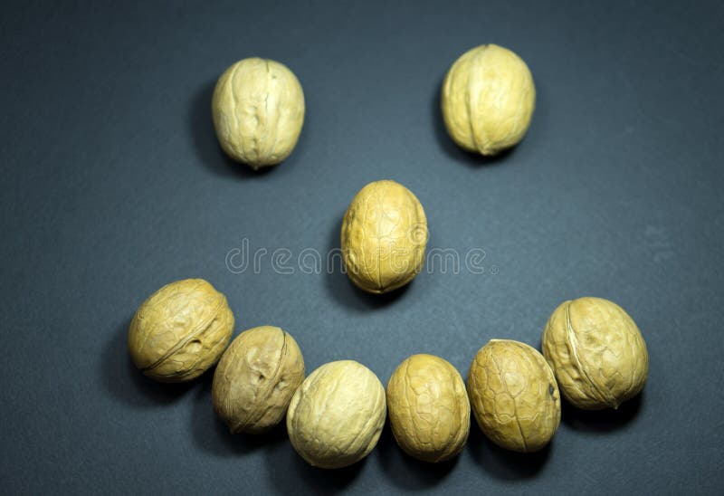 Large Walnuts in Shell on a Black Background. Stock Image - Image of ...