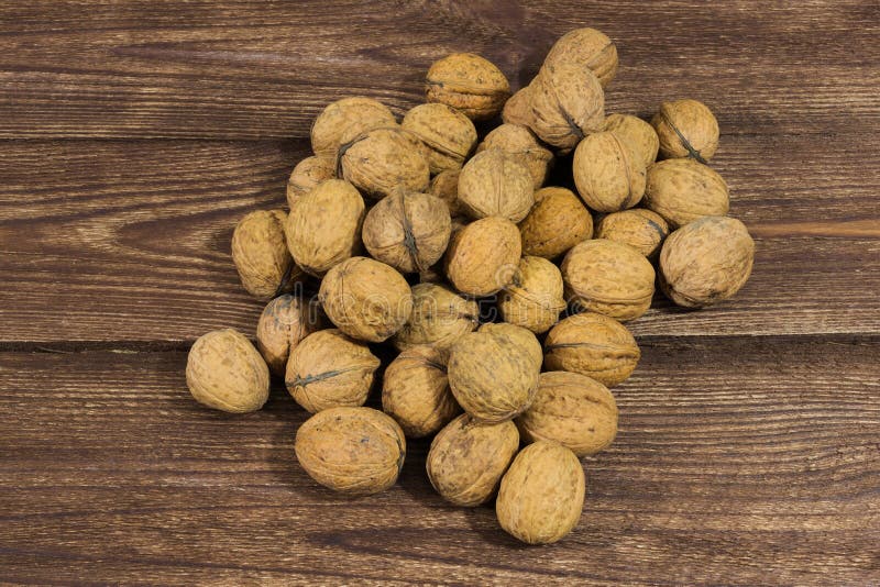 Walnuts. stock photo. Image of plank, shell, coarse, brown - 62607586