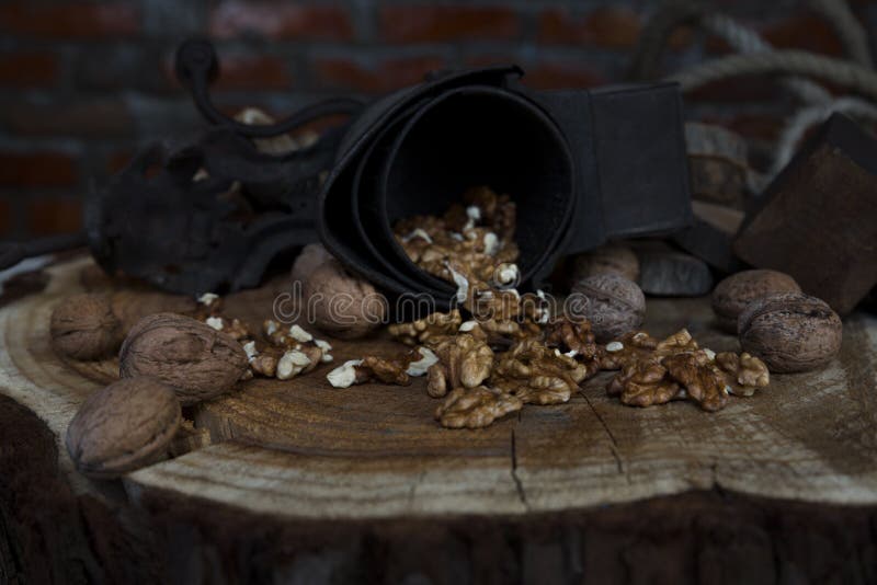 Walnuts on Rustic Old Table with Vintage Hand Grinder Stock Image ...
