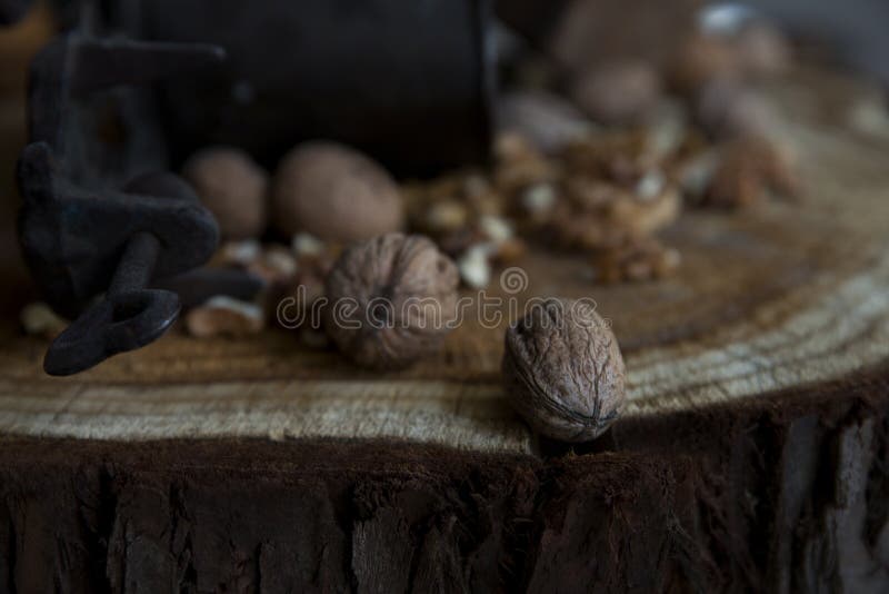 Walnuts on Rustic Old Table with Vintage Hand Grinder Stock Image ...