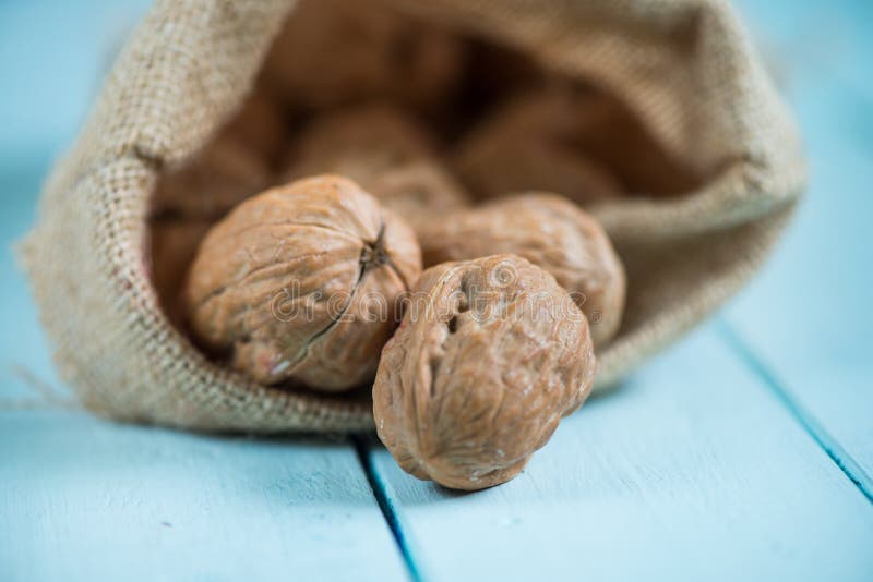 Walnuts in Sack on White Table Stock Image - Image of brown, organic ...