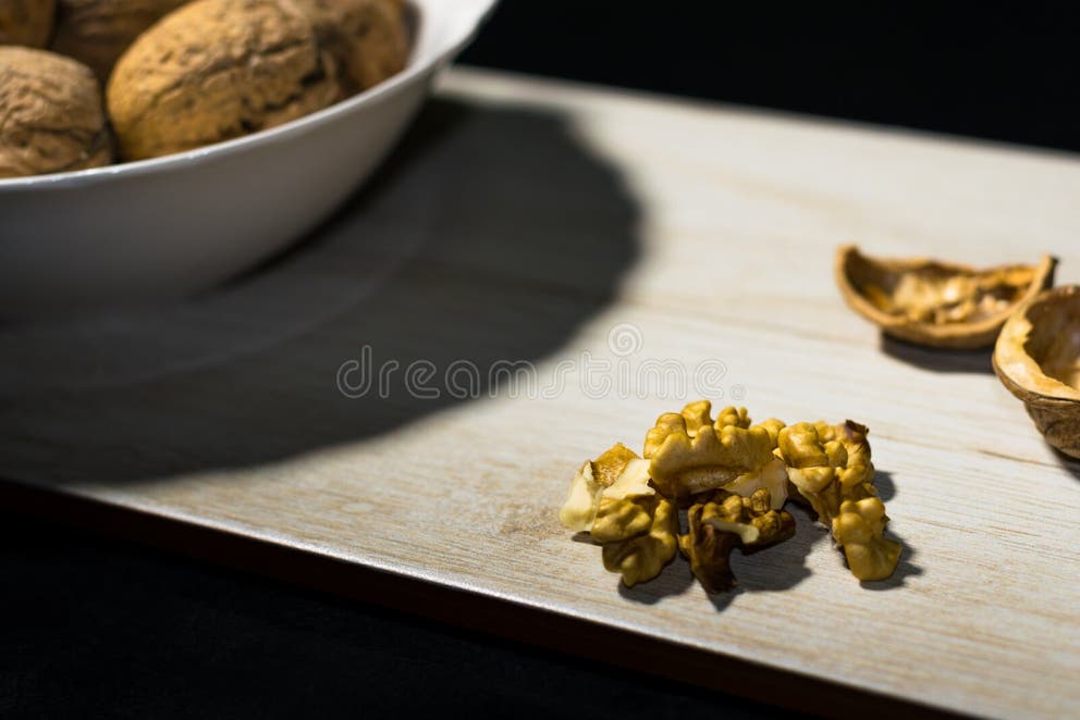 Walnuts, Shells and Bowl Side View Stock Image - Image of dark, closeup ...
