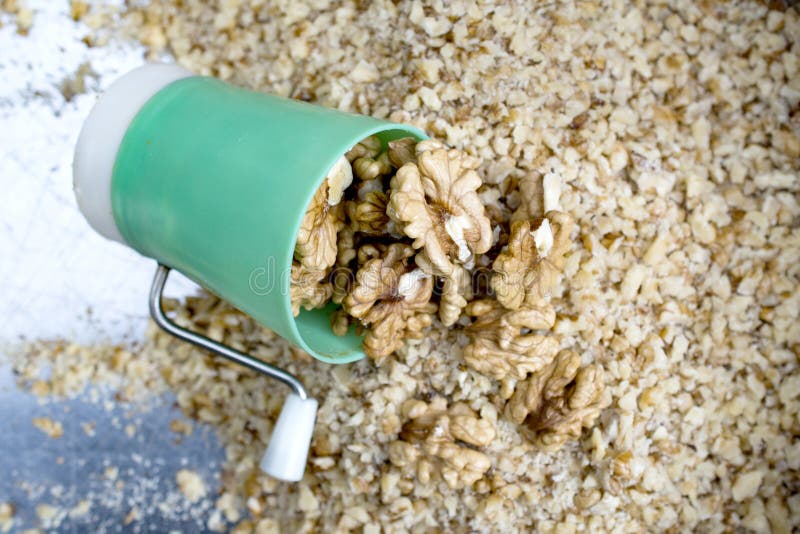 Walnuts on a Small Green Nut Grinder Stock Photo - Image of baking ...