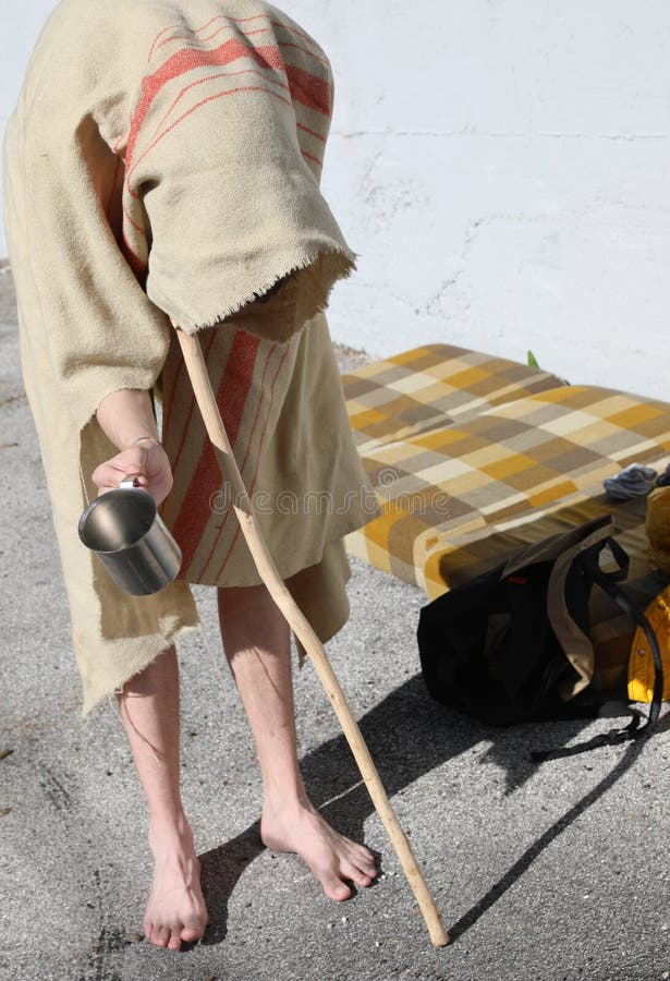 Wanderer with a Stick and Barefoot Asks for Alms Under a Ruined Stock ...