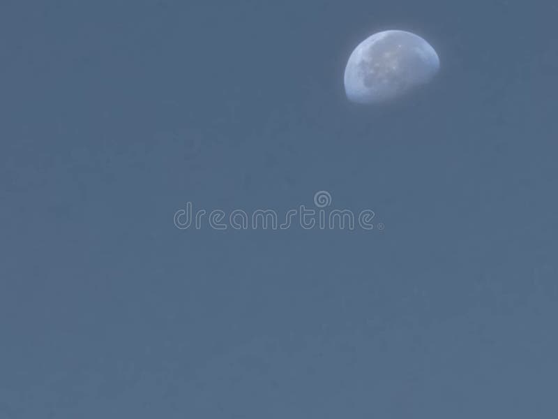 The Waning Moon Hovers in the Sky, Revealing Its Subtle Beauty. Stock ...