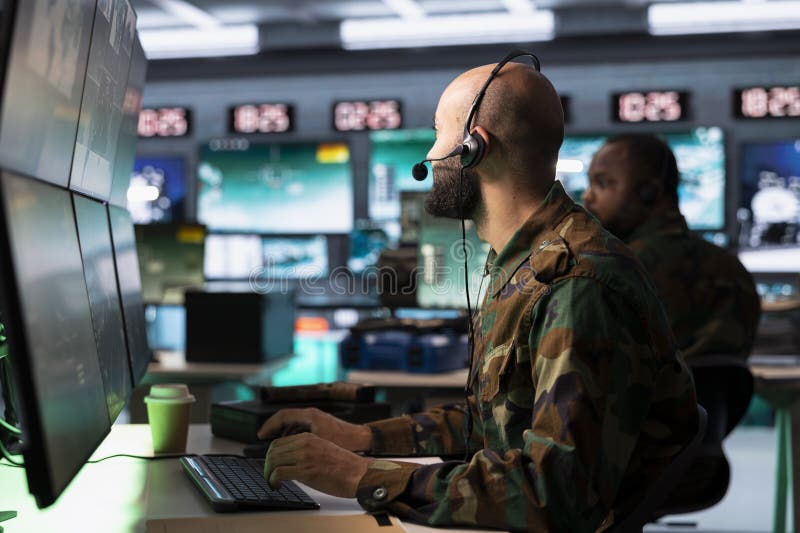 War Telecommunications Operator in Uniform Talking in Headset Mic Stock ...