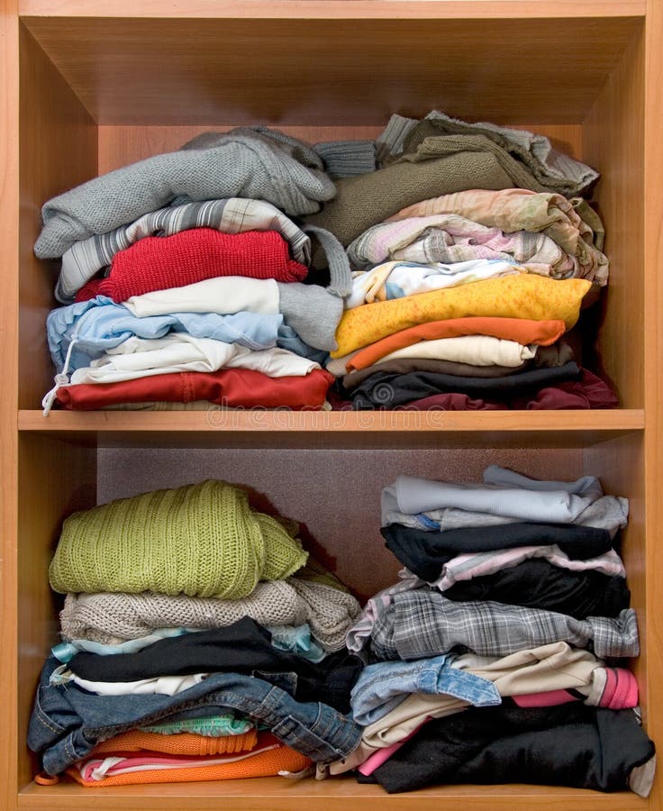 Clothes in the closet stock image. Image of wear, closet - 92626883