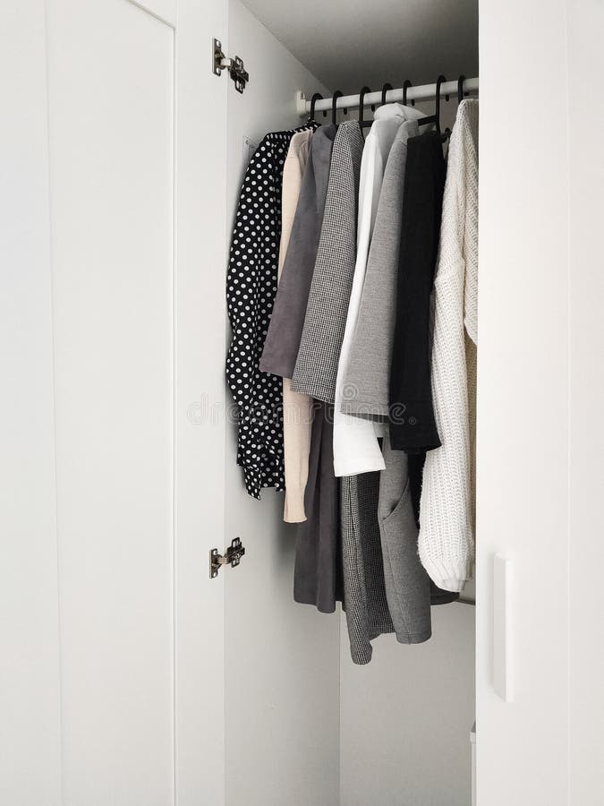 Wardrobe with Basic Clothes in Room Scandi Interior. Neutral Colors ...