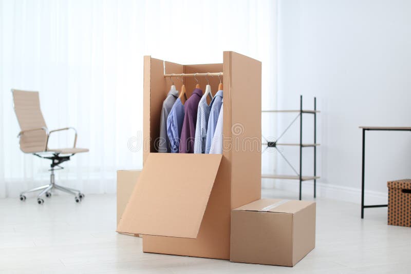 Wardrobe box with clothes stock photo. Image of apparel - 137768338