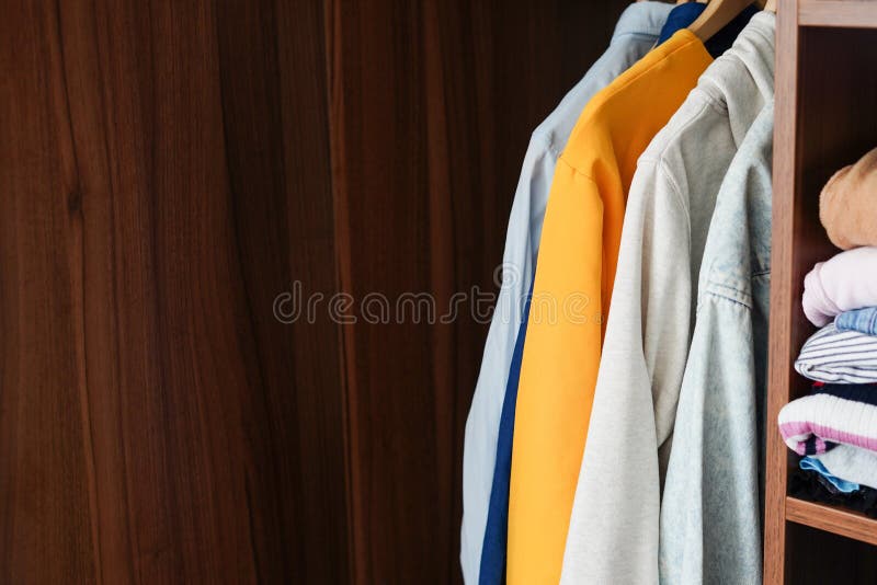 Wardrobe Closet with Different Stylish Clothes at Home, Copy Space ...