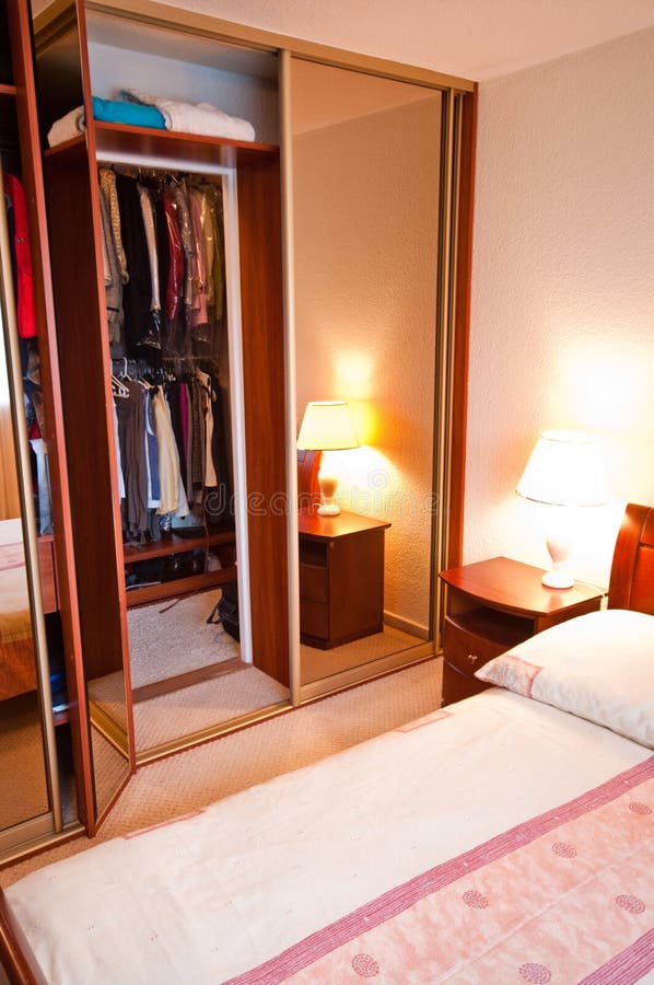 Wardrobe in modern bedroom stock image. Image of hung - 34268143
