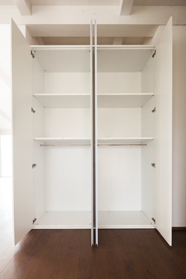 White Wardrobe with Open Spaces Stock Photo - Image of empty, house ...