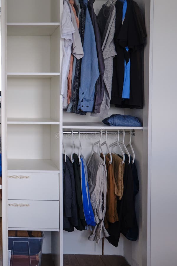 Wardrobe Section with Hanging Things and Clothes Stock Photo - Image of ...