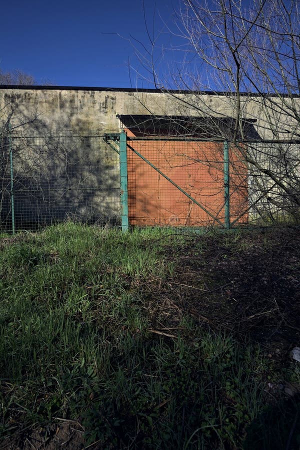 Warehouse Behind a Closed Gate Stock Photo - Image of blank, gate ...
