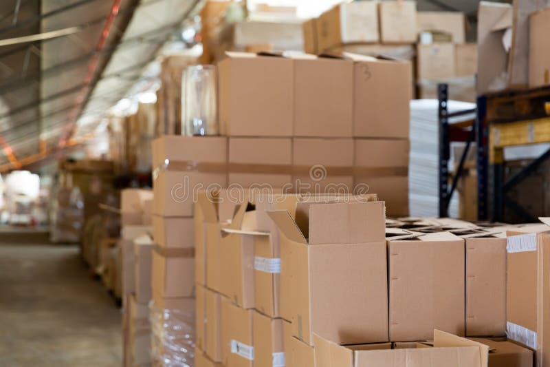 Warehouse - Boxes with Various Goods on Racks and on Floor Stock Photo ...