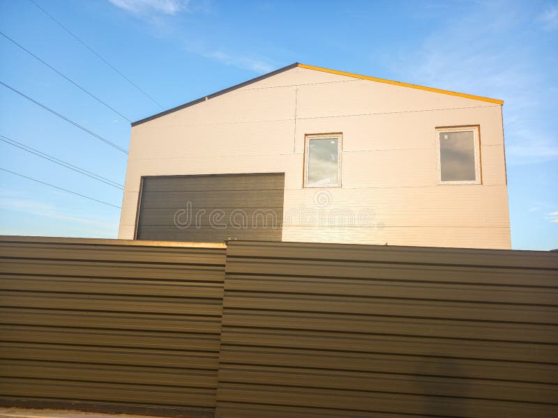 Warehouse Building with Fence. Industrial Warehouse Stock Photo - Image ...