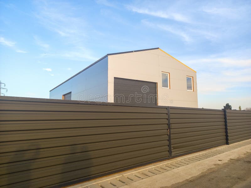 Warehouse Building with Fence. Industrial Warehouse Stock Image - Image ...