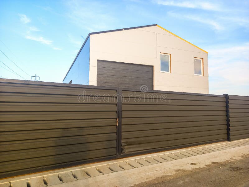 Warehouse Building with Fence. Industrial Warehouse Stock Image - Image ...