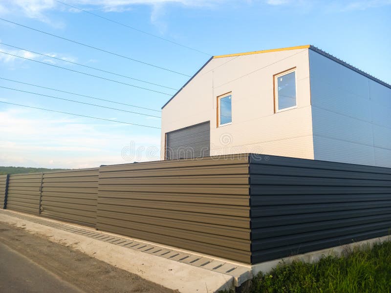 Warehouse Building with Fence. Industrial Warehouse Stock Photo - Image ...