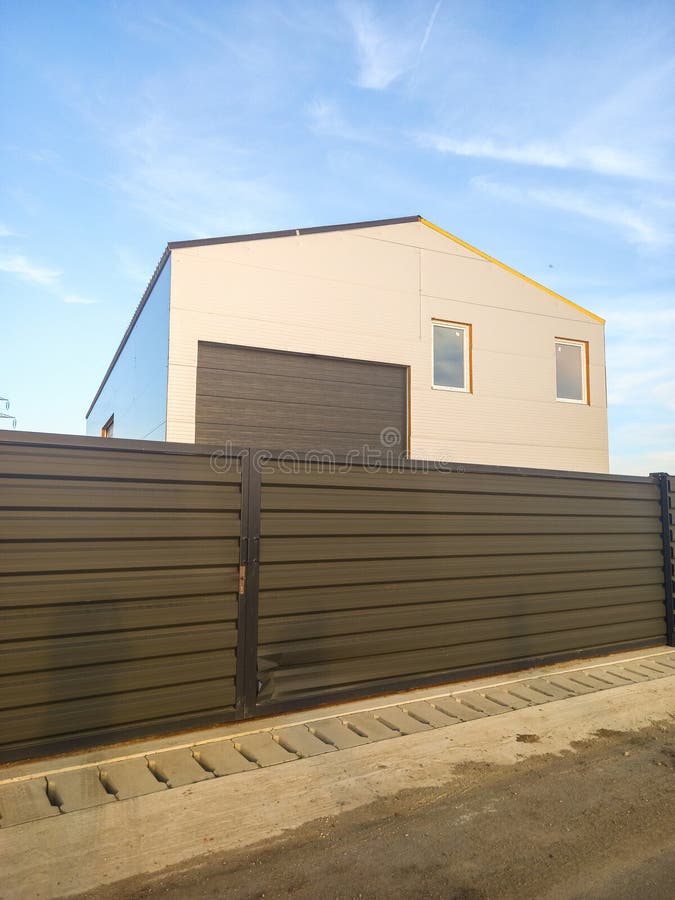 Warehouse Building with Fence. Industrial Warehouse Stock Photo - Image ...