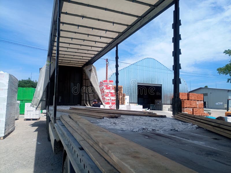 Warehouse of Building Materials. Building Base, Metal, Wood and Blocks ...