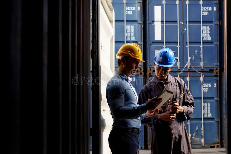 Warehouse Business Manager and Port Worker Working and Checking ...
