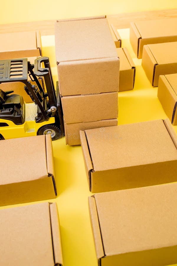 Warehouse with Cardboard Kraft Boxes and a Forklift Truck. Cargo ...