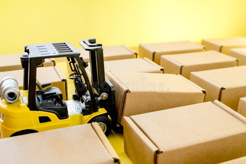 Warehouse with Cardboard Kraft Boxes and a Forklift Truck. Cargo ...