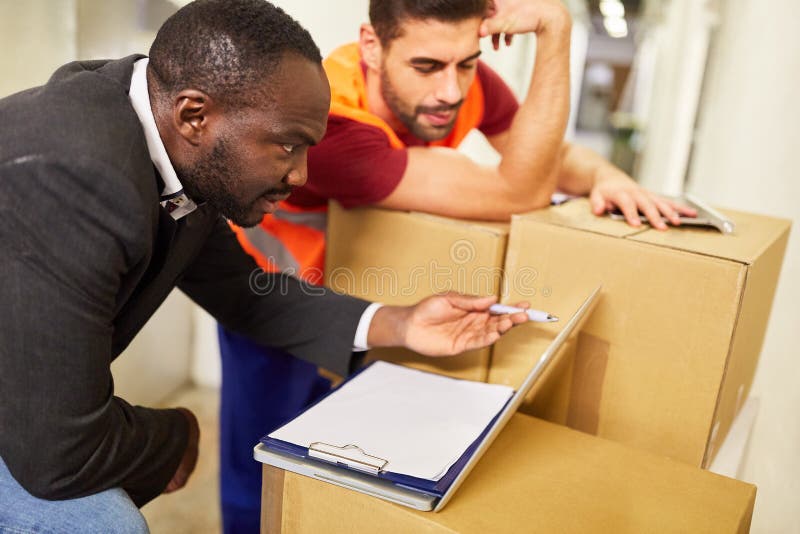 Warehouse Clerk and Entrepreneur at the Tablet Computer Stock Photo ...