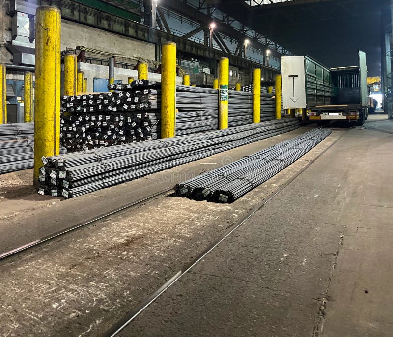 Warehouse of Construction Reinforcement and the Process of Loading ...