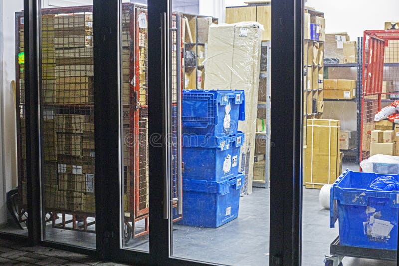 Warehouse Delivery of Various Goods through Doors. Stock Image - Image ...