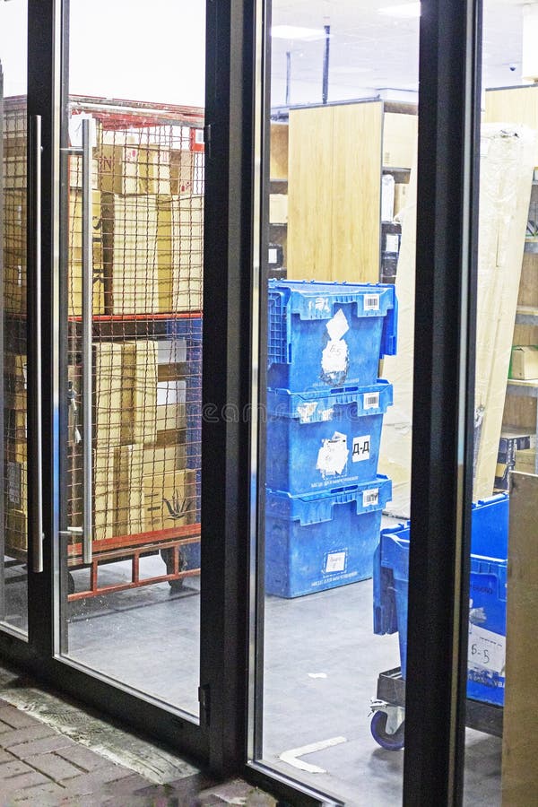 Warehouse Delivery of Various Goods through Doors. Stock Image - Image ...