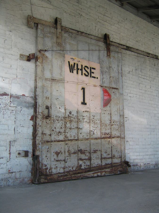 Warehouse Door with Pulley stock image. Image of storage - 116205