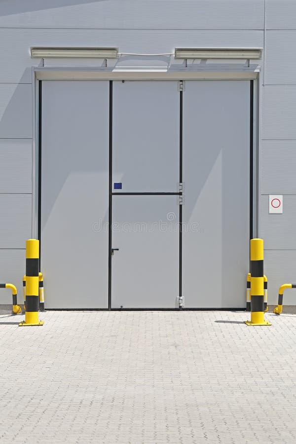 Warehouse Door stock image. Image of entrance, industrial - 140410661