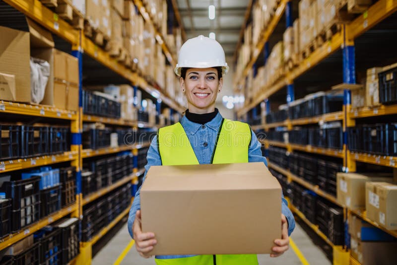 Warehouse Female Worker Checking Up Stuff in a Warehouse. Stock Photo ...