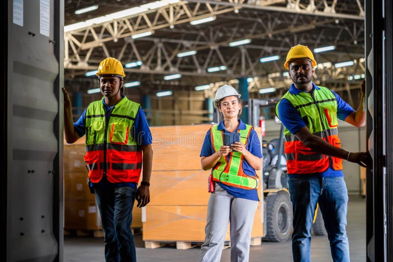 Warehouse Foreman Worker Team Checking Containers in Factory Warehouse ...