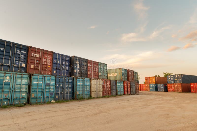 Warehouse of Freight Containers. Metal Boxes Loaded with Each Other in ...
