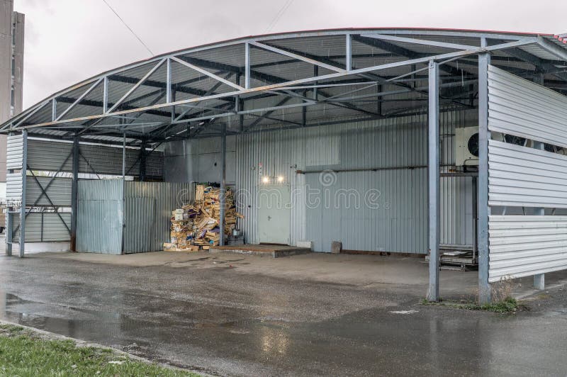 Warehouse on a Gray Rainy Day Stock Photo - Image of door, industry ...