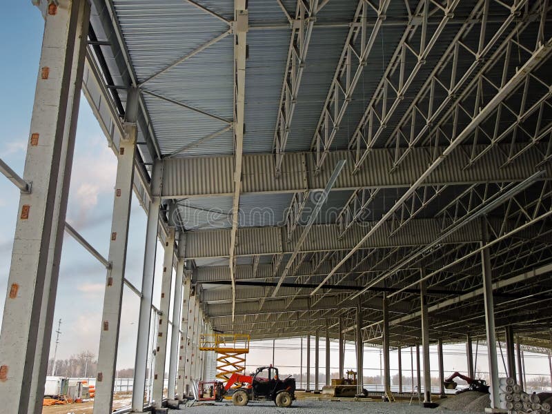 Warehouse with High Columns, Metal Rafter Structures. Construction of a ...