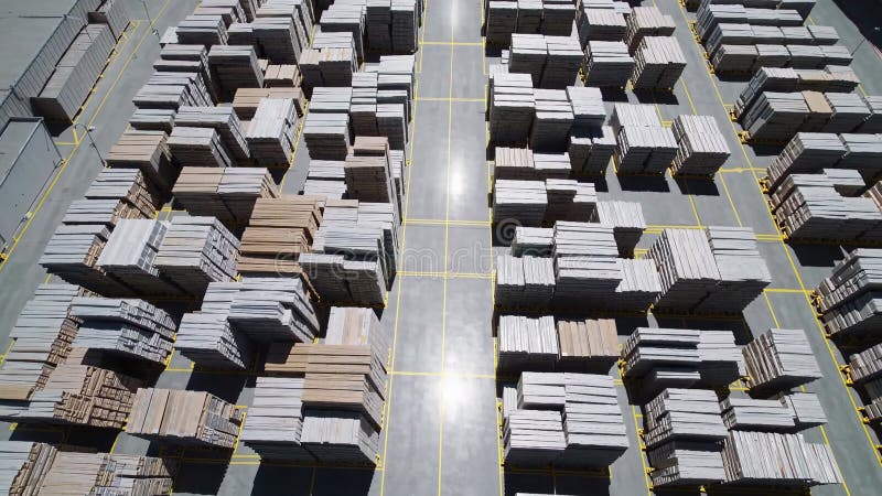 Warehouse Interior Revealing Methodical Stacking of Wooden Construction ...